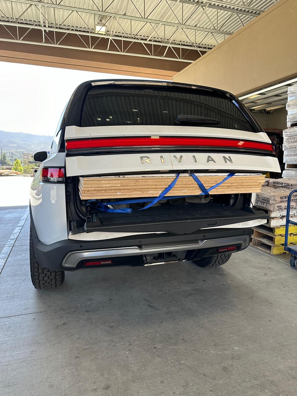 4x8 sheet of plywood fits with the gate closed. | Rivian Forum - R1T ...