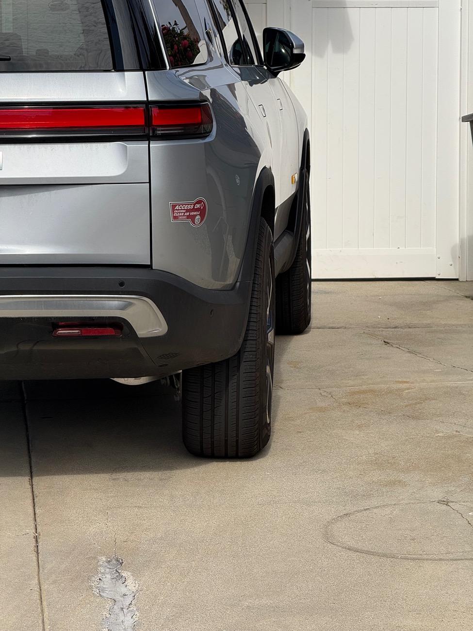 Rivian just rotated my tires - but the rear wheels seem crooked now ...