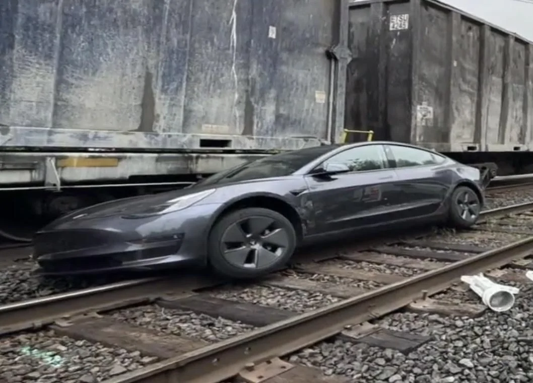 Tesla FSD drives down railroad tracks, gets hit by train | Rivian Forum ...