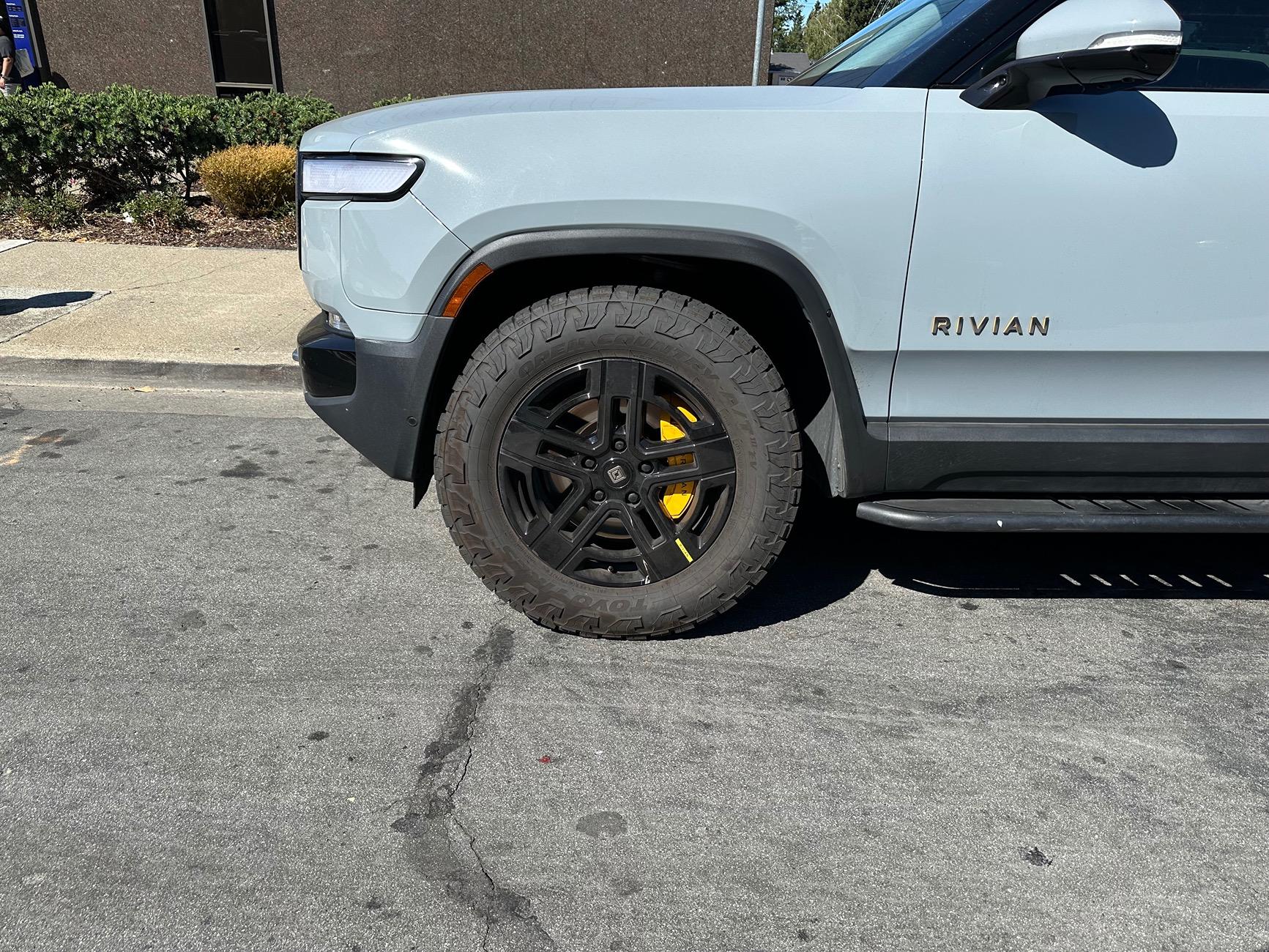 Left front wheel isn’t centered in wheel well properly | Rivian Forum ...
