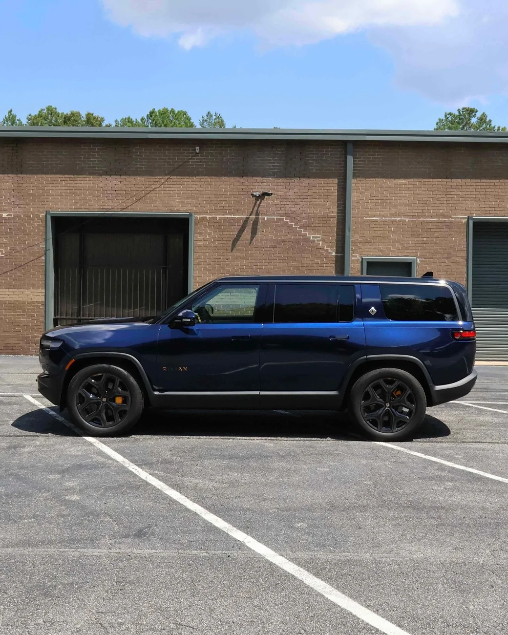 From Stock Color to Stunning: My R1S in Dark Blue Wrap | Rivian Forum ...