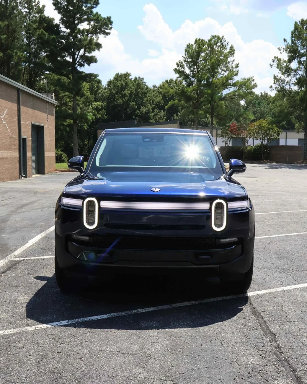 From Stock Color to Stunning: My R1S in Dark Blue Wrap | Rivian Forum ...