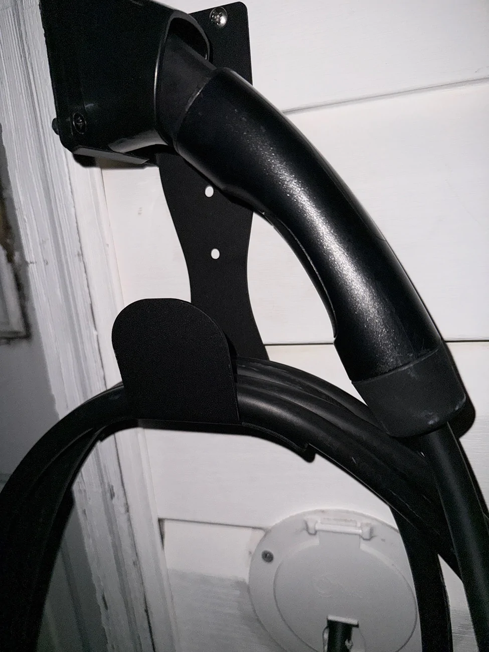 I installed an EV charging cable pass through -- cable hatch in house ...