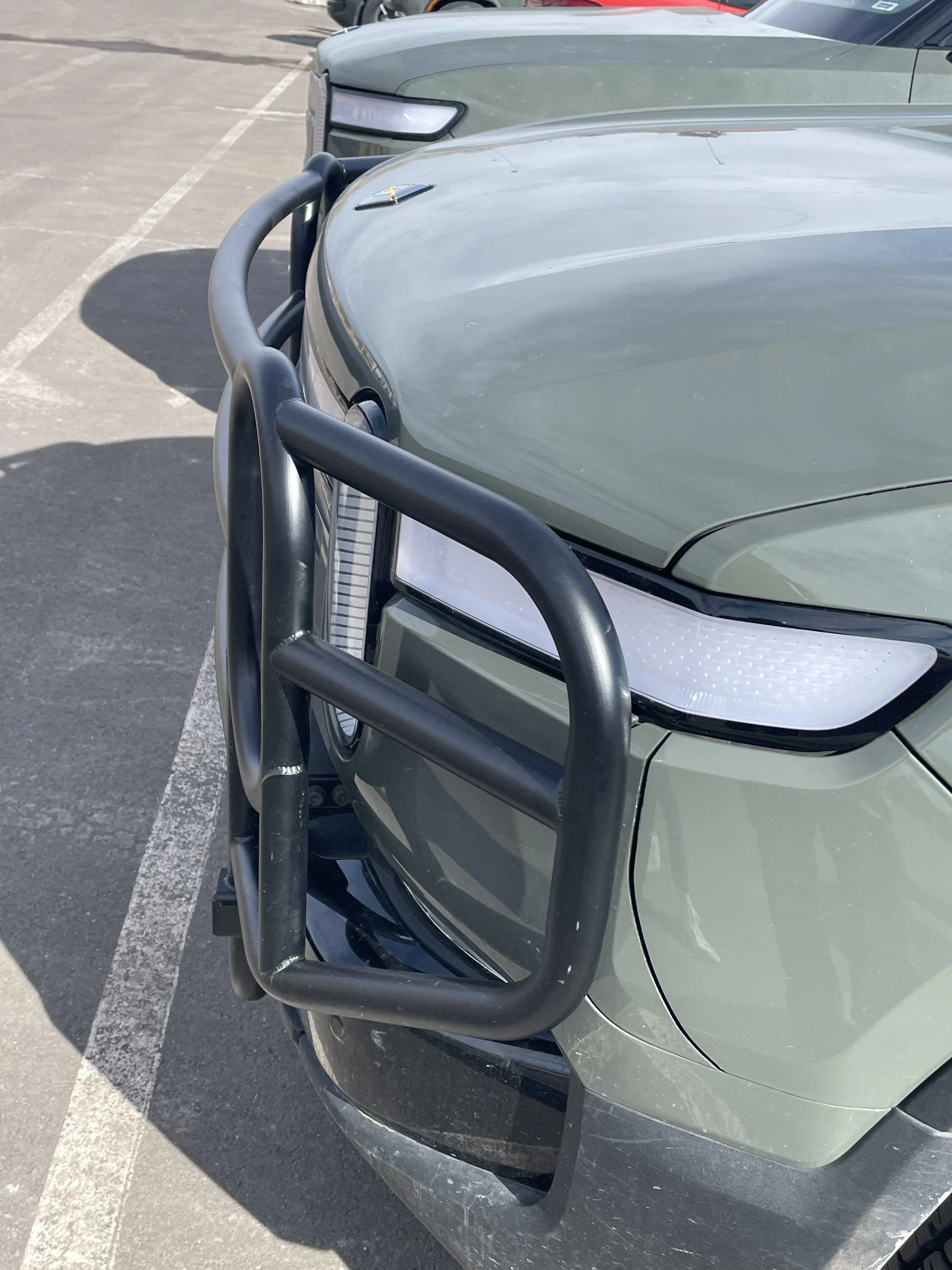 Brush Bars Grille on R1T spotted at Denver SC | Rivian Forums - R1T R1S ...
