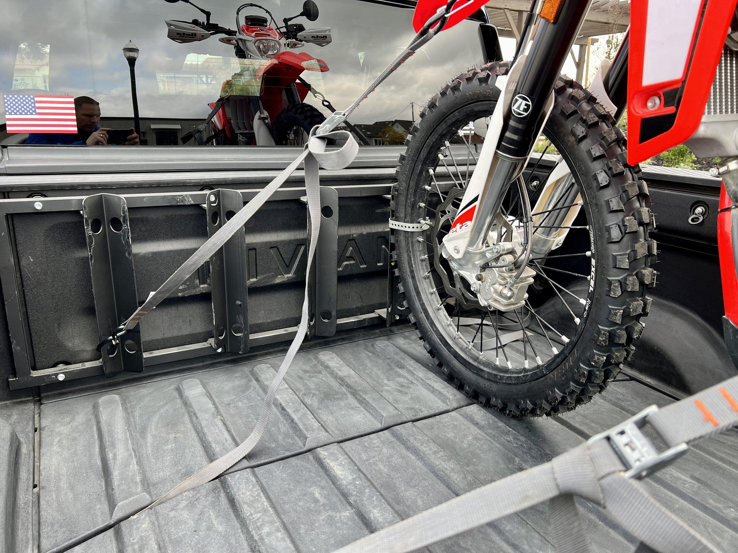 Motorcycle wheel chock system installed in the bed. Just needs a coat ...