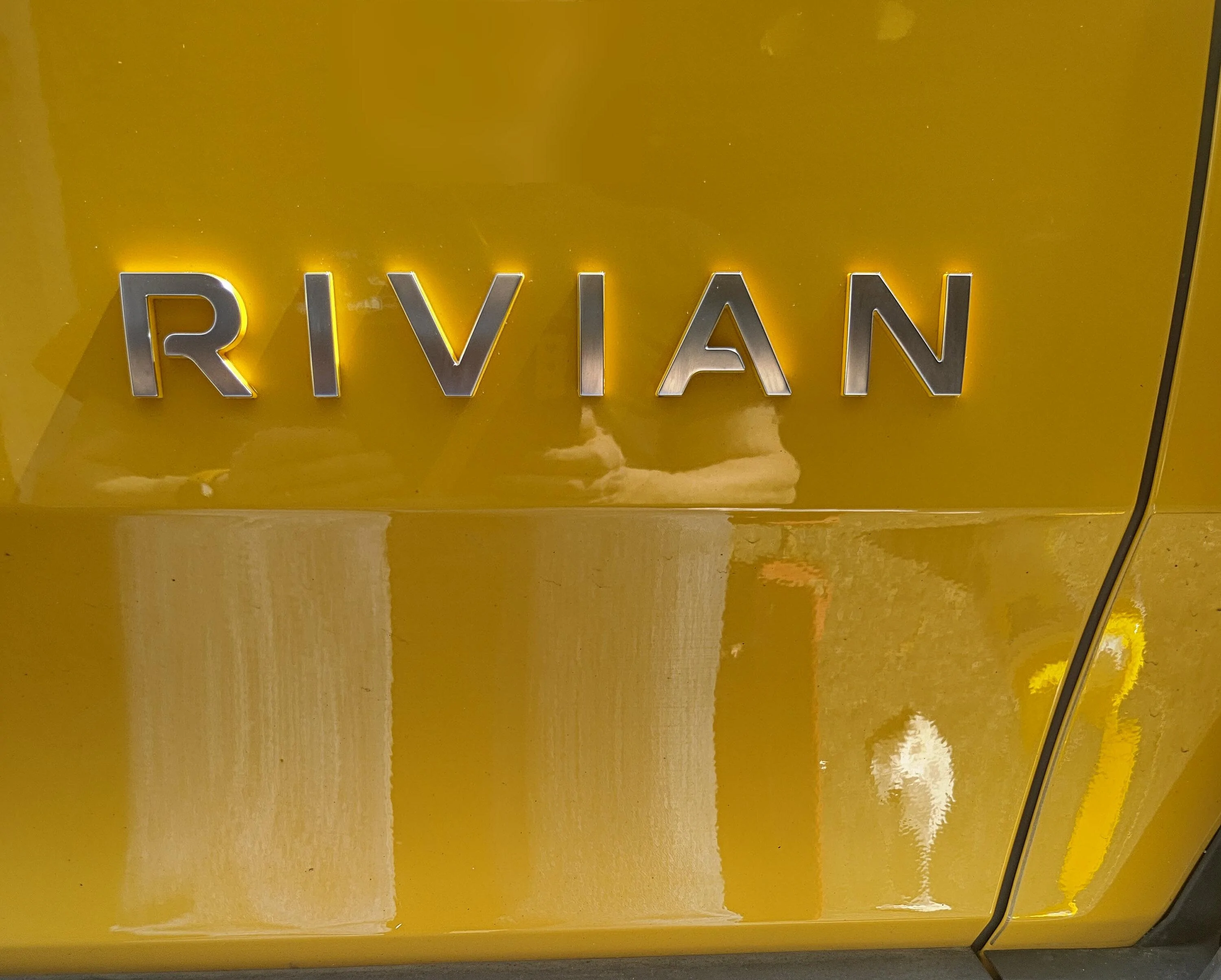 Blacked out my logos with vinyl | Rivian Forum - R1T R1S R2 R3 News ...