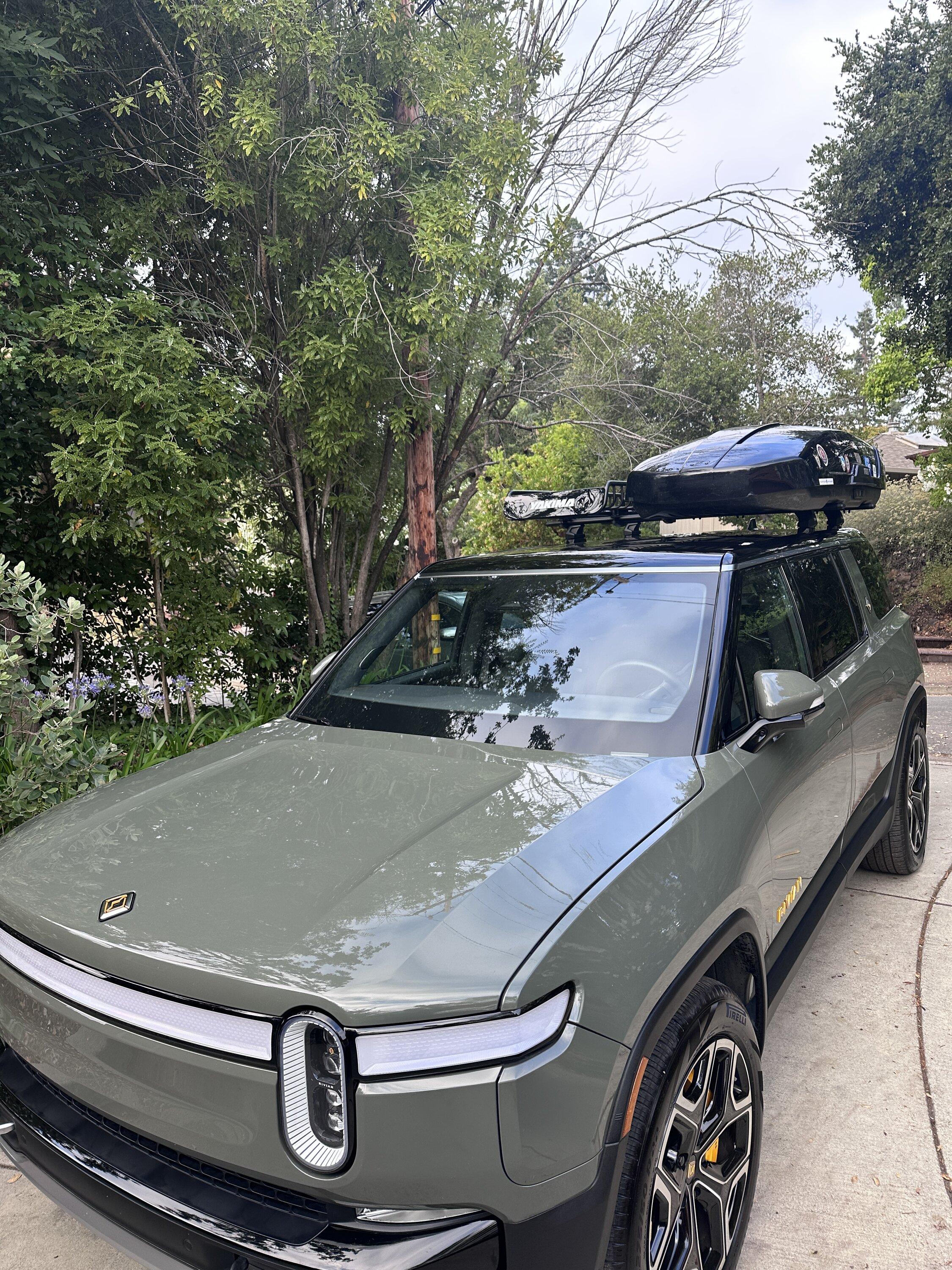 Thule roof rack, box and cage installed on R1S for road trip | Rivian ...