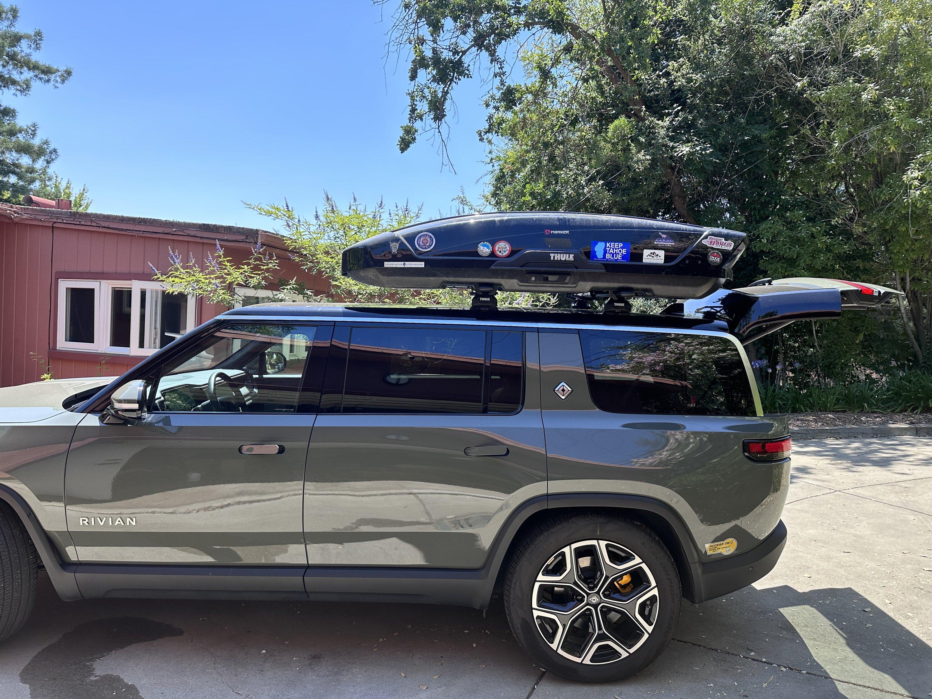 Thule roof rack, box and cage installed on R1S for road trip | Rivian ...