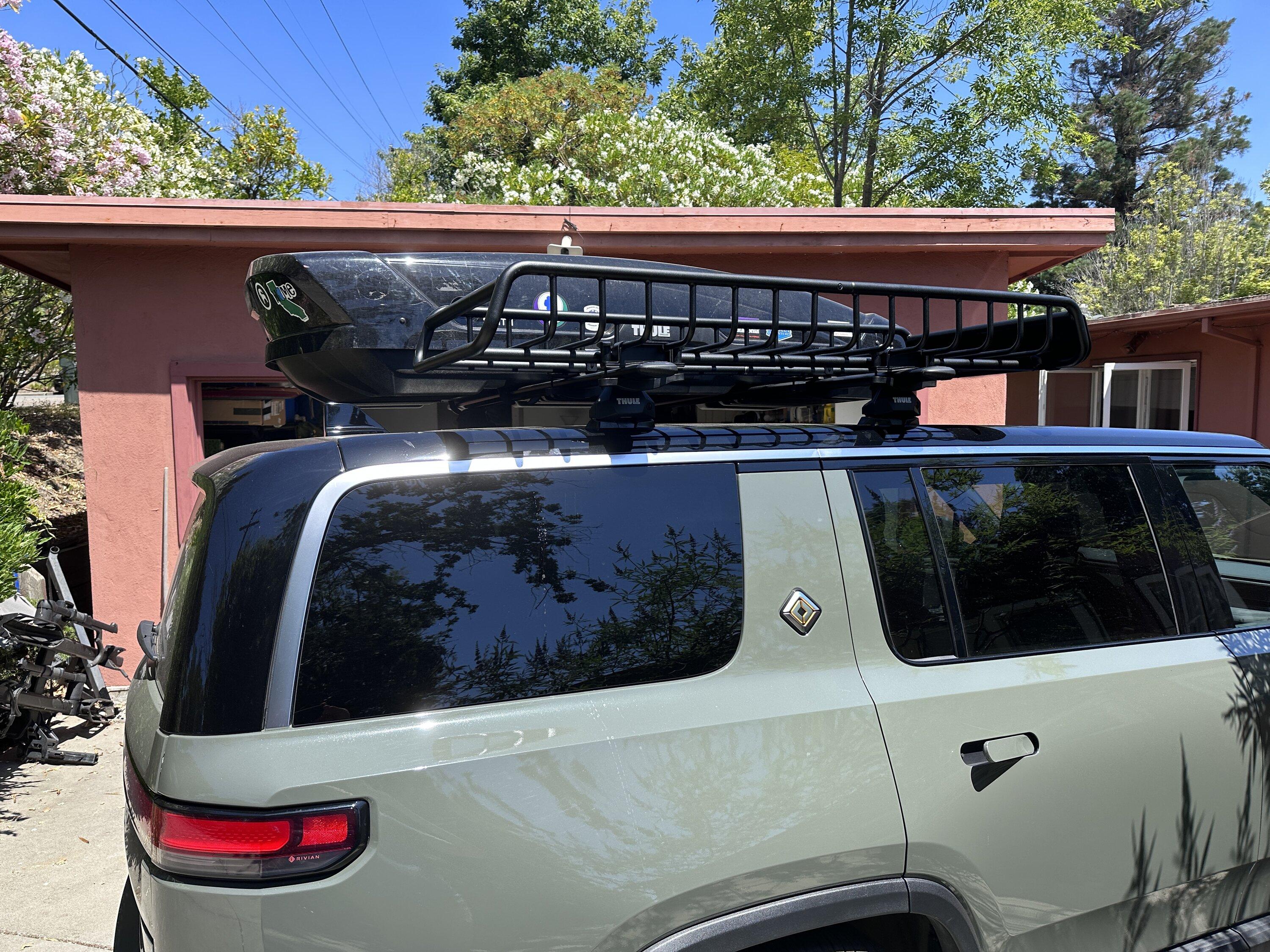 Thule roof rack, box and cage installed on R1S for road trip | Rivian ...
