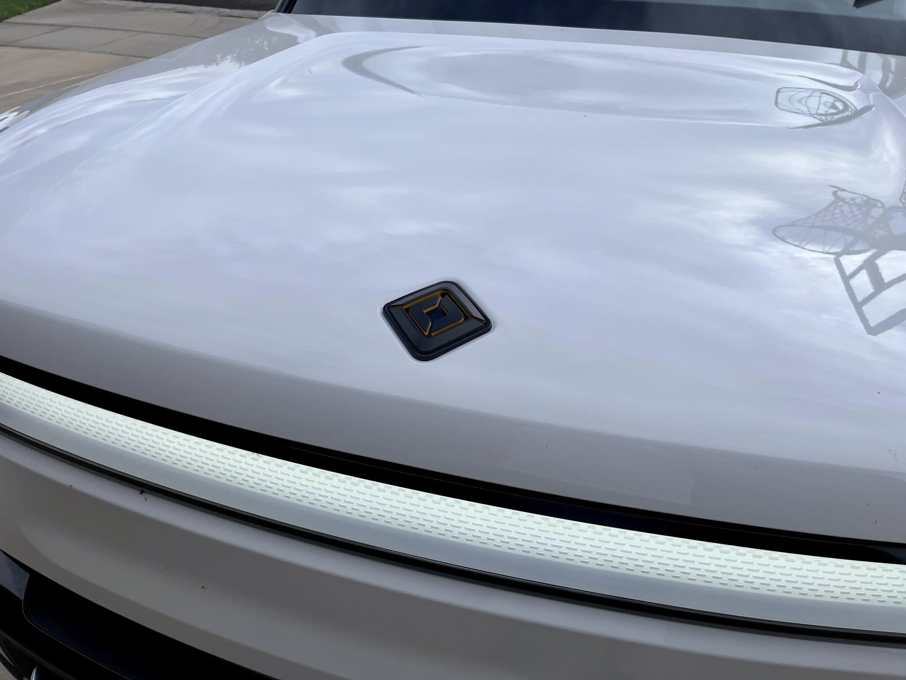 Black Rivian Badges and Sunshade from Abstract Ocean | Rivian Forum ...