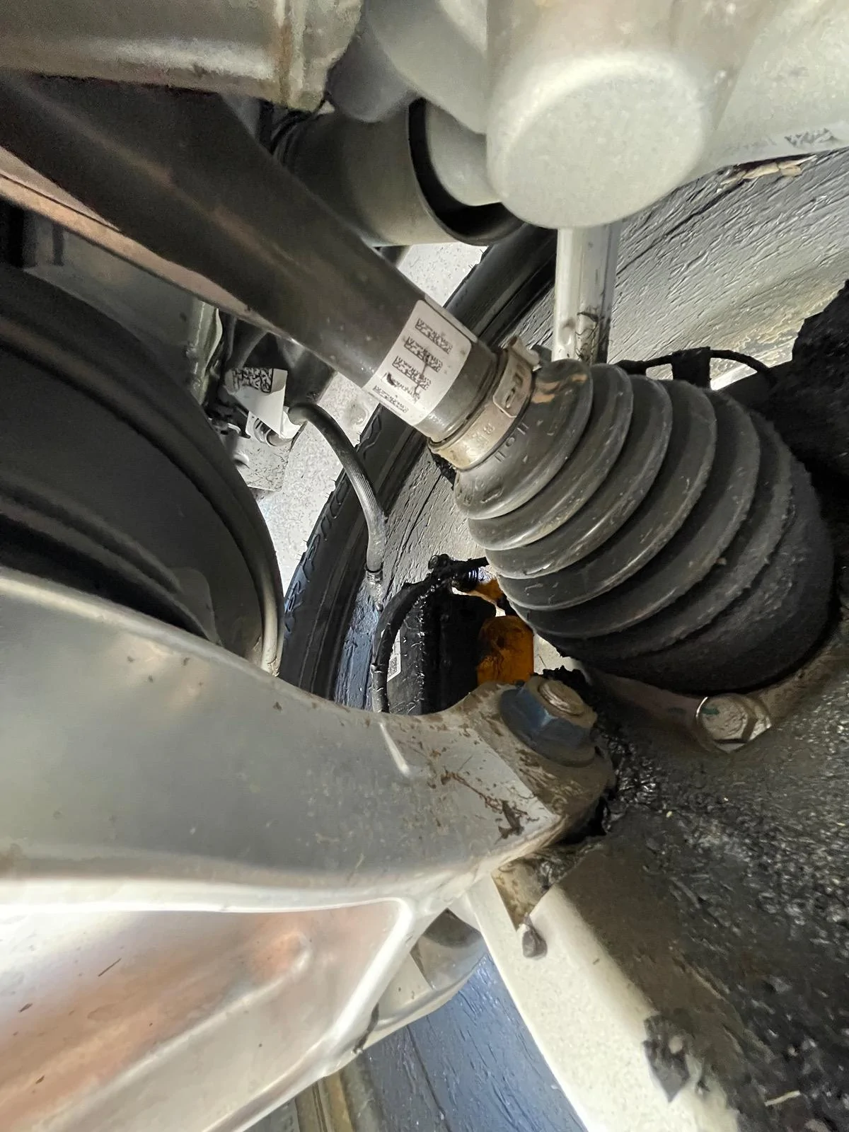 Black fluid (oil?) coming from Rear Driver side | Rivian Forum - R1T ...